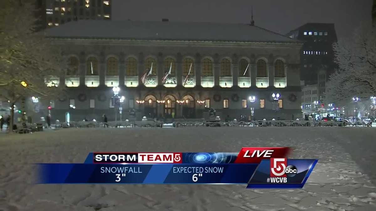 Boston keeps bustling through first snow of season