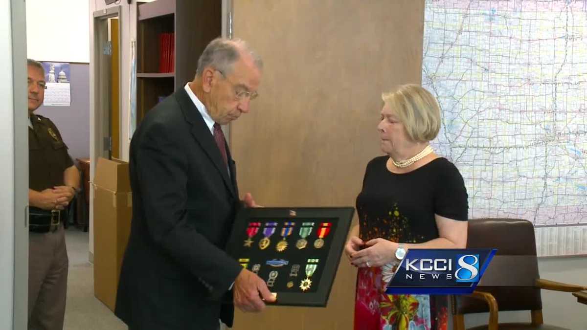 Military widow receives medals on late husband's behalf