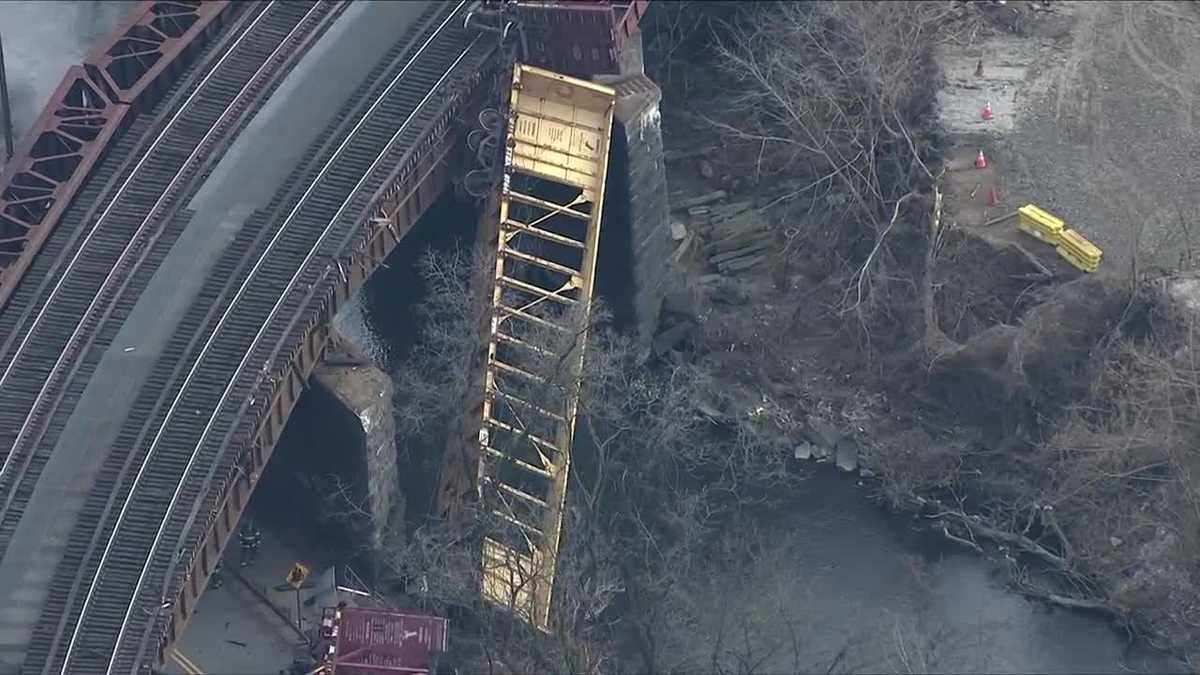 Photos: Freight train derails on bridge in north Baltimore