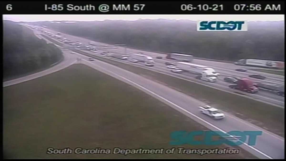 Traffic slow on Interstate 85 while burned tractor-trailer is unloaded