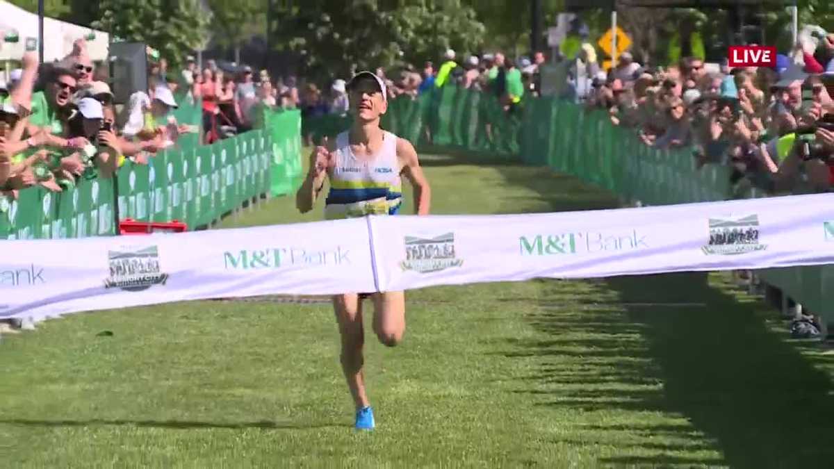 Top runners claim titles at Vermont City Marathon