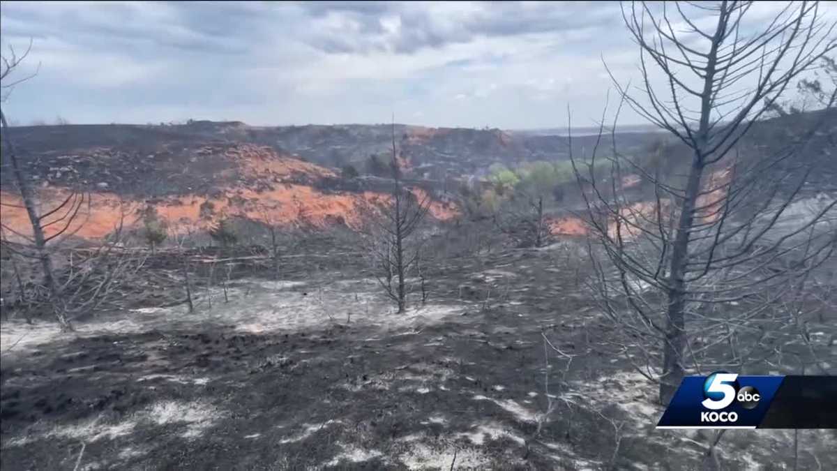 Wildfire in Mooreland now 60% contained, firefighters say