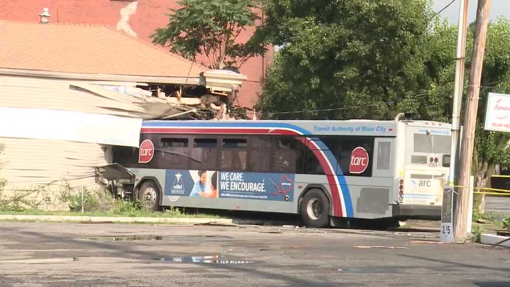 Russell Barbershop vows to rebuild after bus slams building