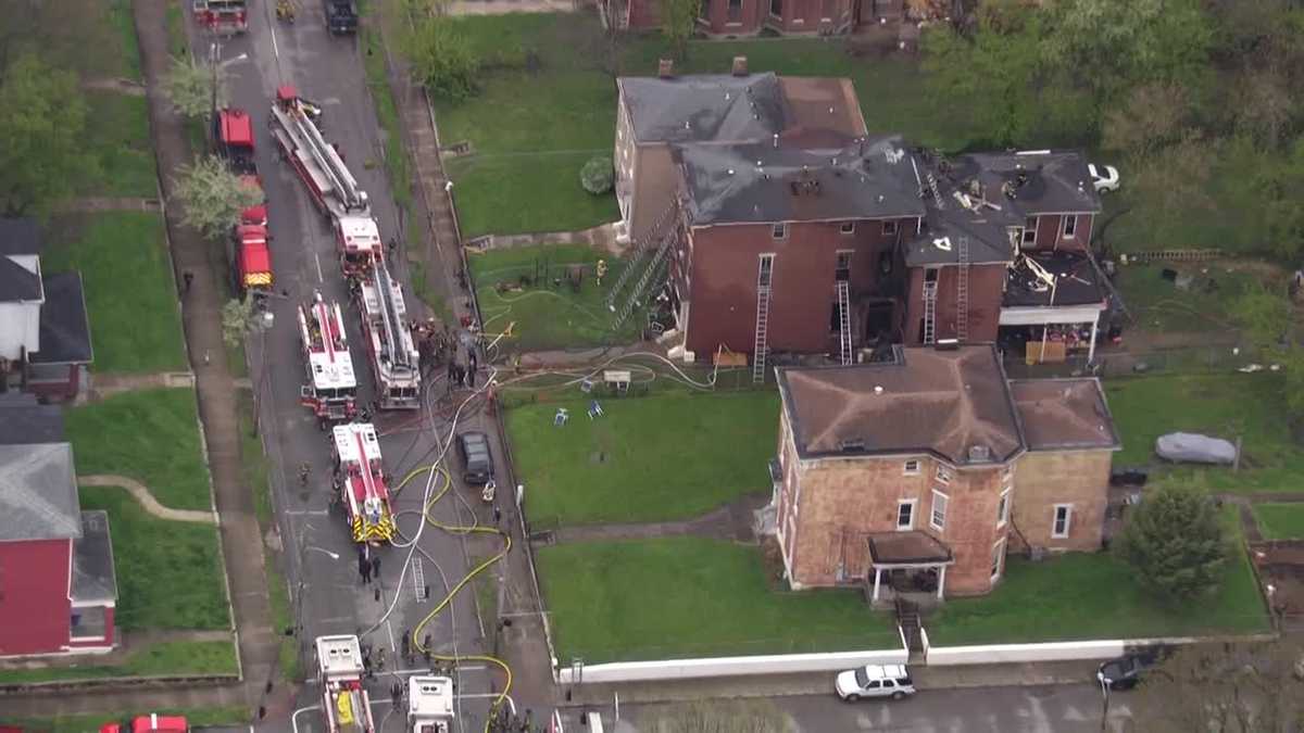 3 firefighters injured, person rescued in Russell neighborhood fire