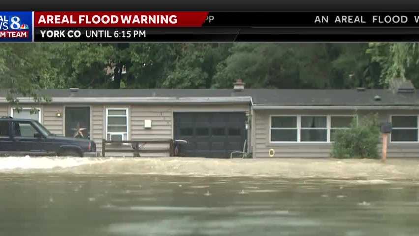 Flash flood waters surround home in Manor Township