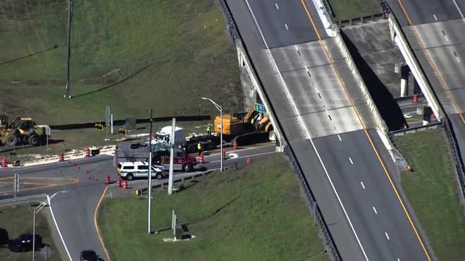 Traffic halts in Wildwood after semi hits bridge
