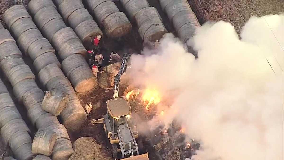 Hay bale fire causes large plume of smoke near Norman