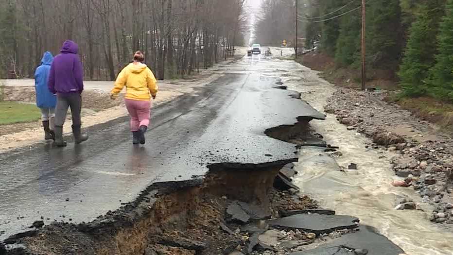Maine, NH flooding damages roadways, takes down tree limbs