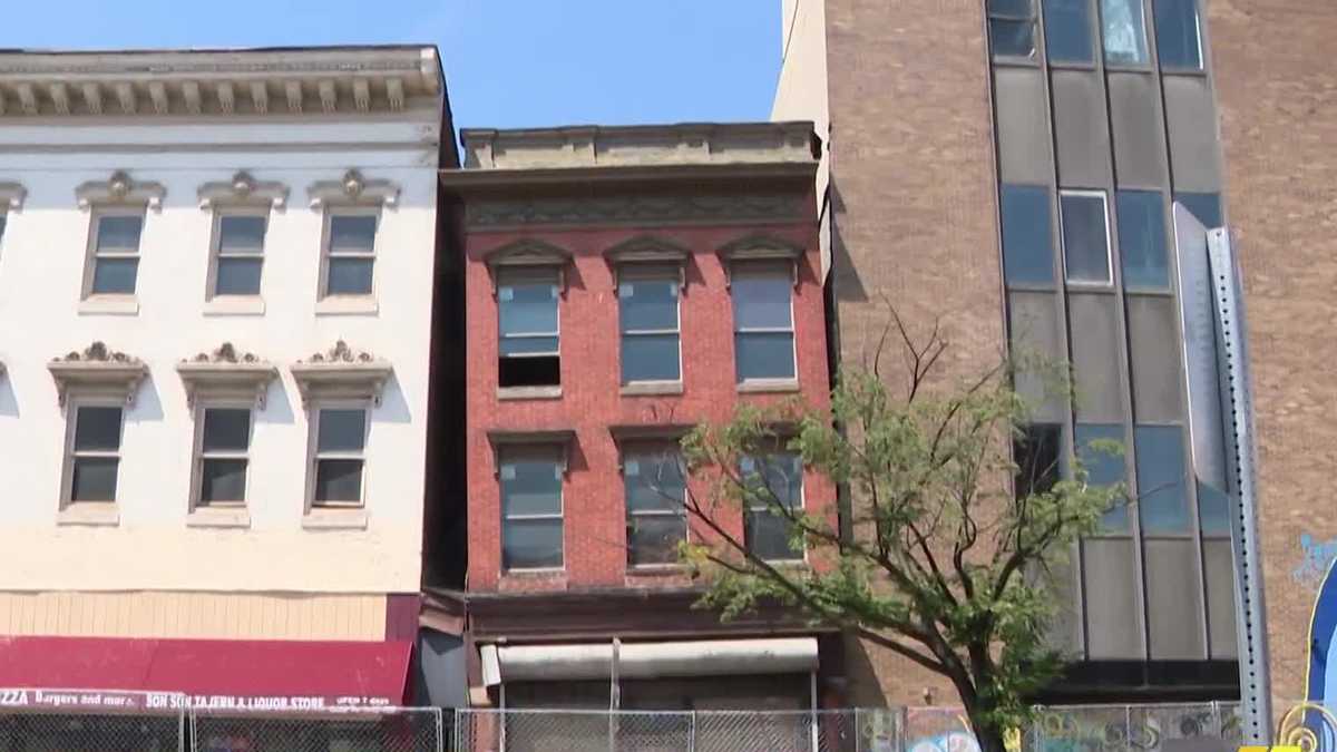 2 structures condemned after partial building collapse