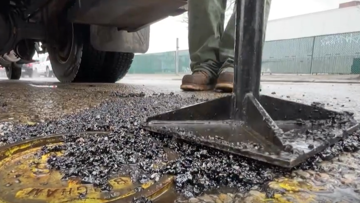 Cincinnati Mayor Pureval helps patch potholes as crews continue repairs