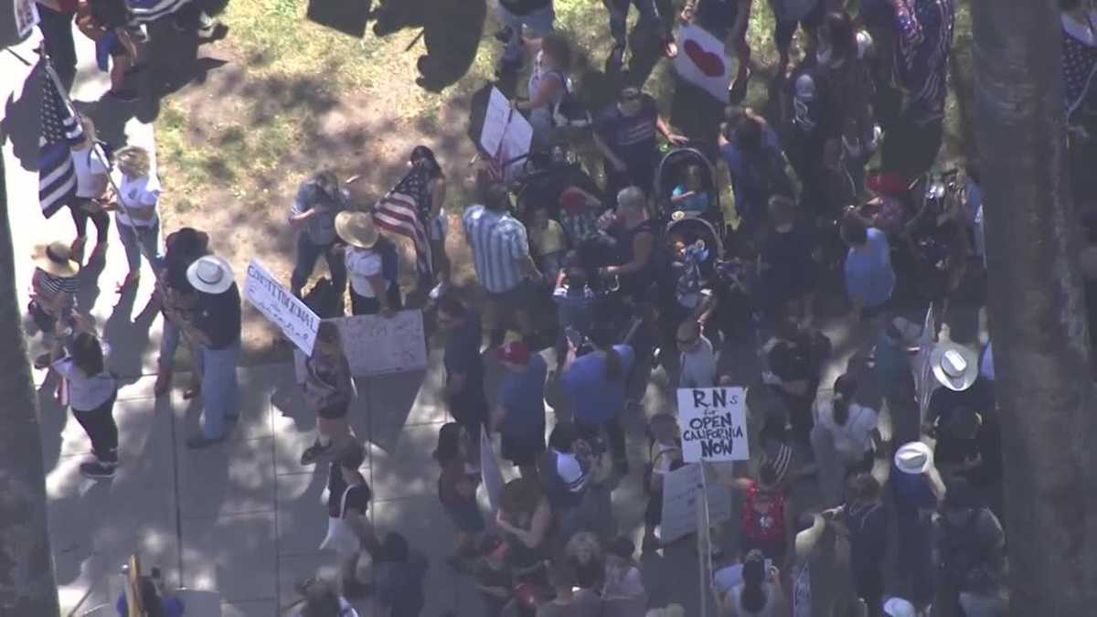 Demonstrators gather at Capitol to protest virus order