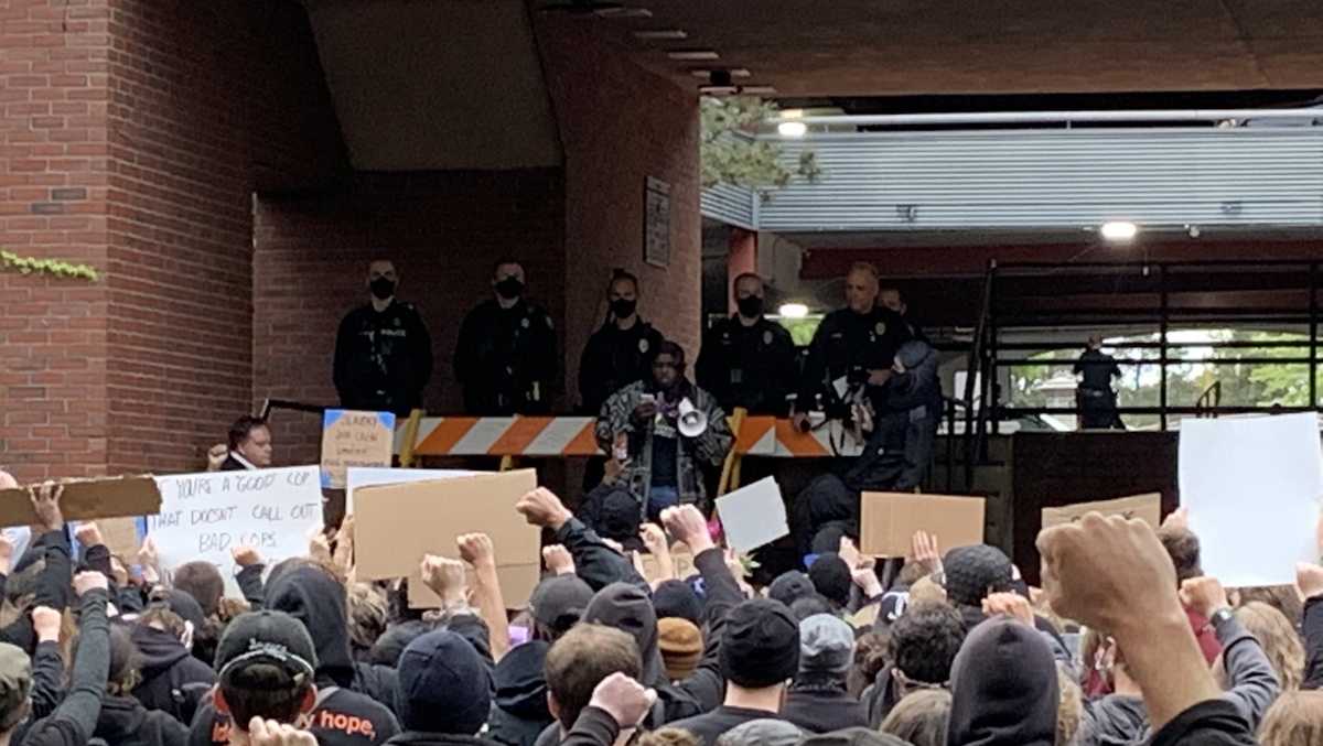 Peaceful protest turns tense outside Portland police headquarters, 10 ...
