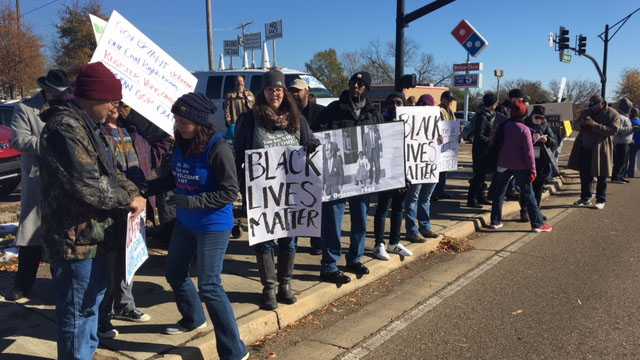 Protesters gather as president arrives at museums