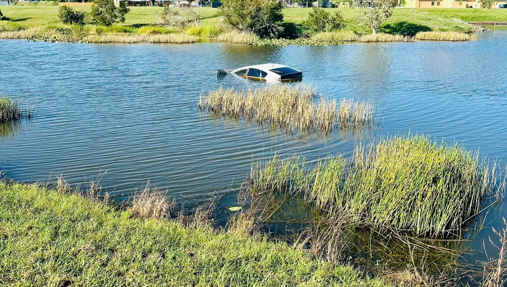 Florida man saved after being trapped in sinking vehicle