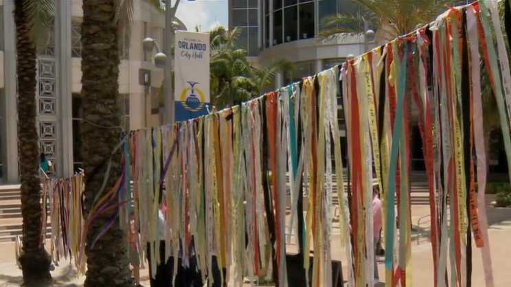 Ribbons outside of Orlando City Hall honor Pulse victims