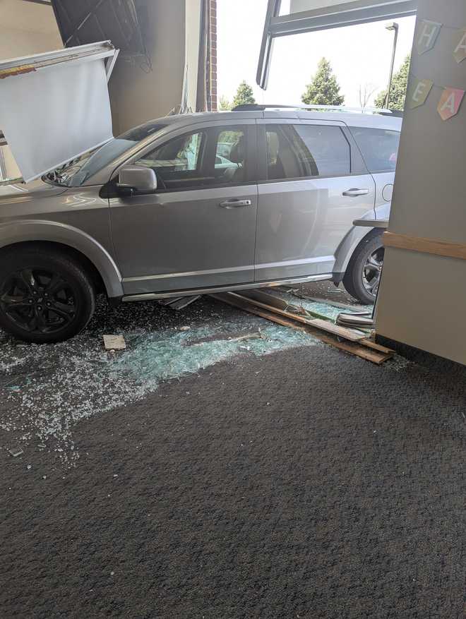 PHOTOS | Vehicle crashes through Bardstown Road allergy center