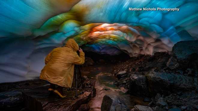 Photographer discovers rare rainbow illuminating an ice cave in Mount Rainier National Park