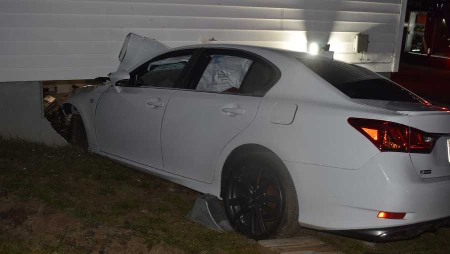 Driver hospitalized after car crashes into Randolph, Massachusetts home
