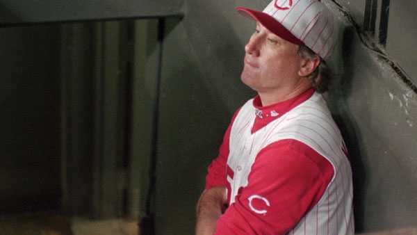 Former Reds player, manager charged with assault
