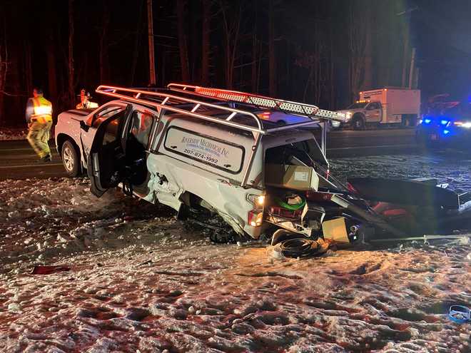Charges pending, driver hurt in two-car crash in Raymond