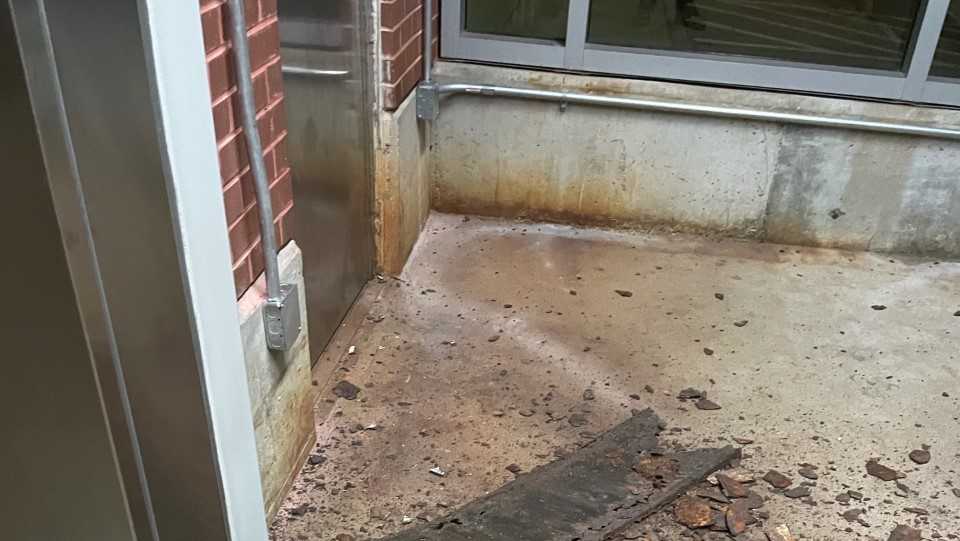 Metal falling from MBTA stairs narrowly misses Red Line rider