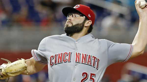 Reed earns 1st win as starter, Reds top Marlins 4-2