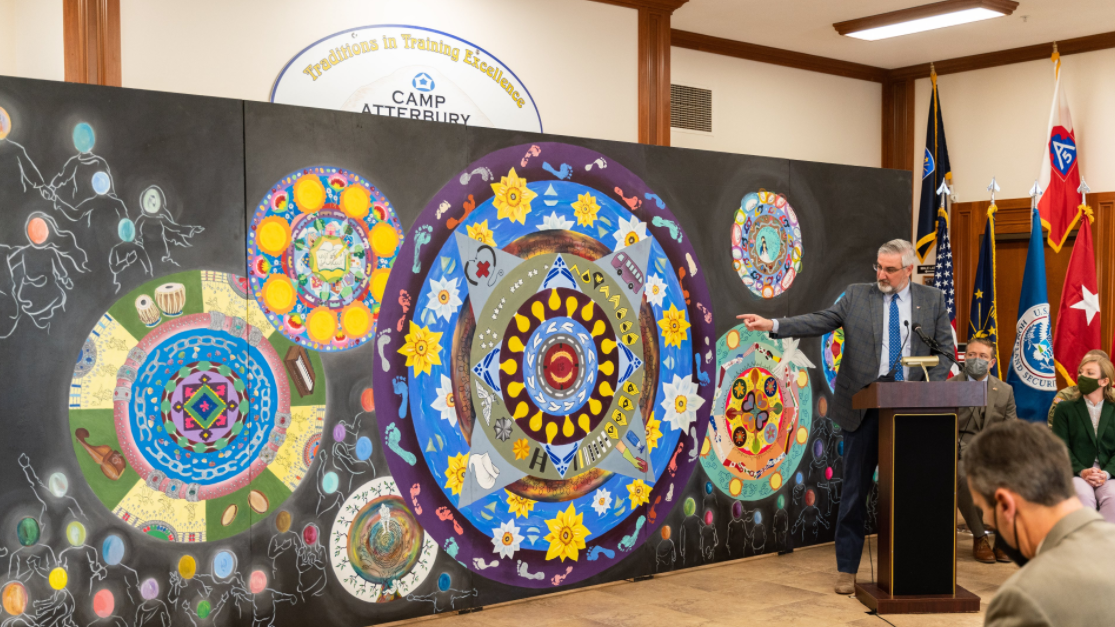 Mural created by Afghan refugees unveiled at Camp Atterbury