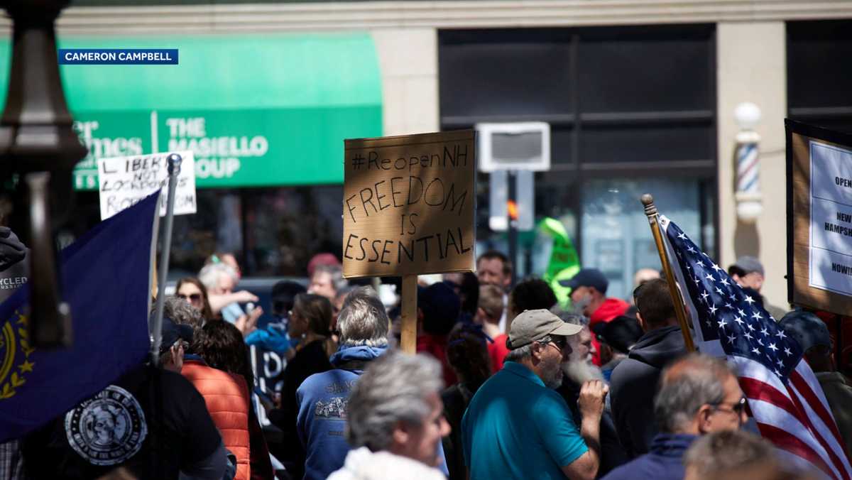 People rally at the State House against the stay-at-home order