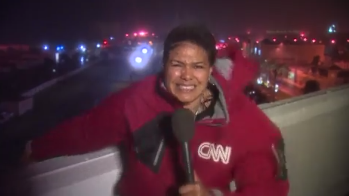 Reporter struggles to stand in strong winds from Hurricane Irma