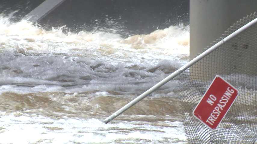 Reservoir operators work to keep pace with rising water