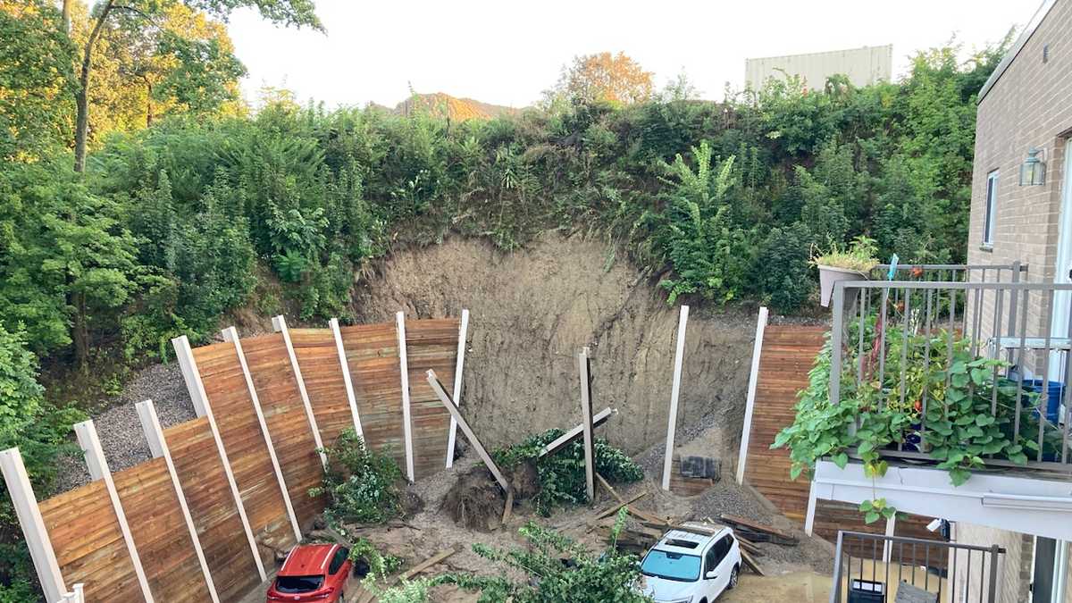 Cleanup underway after Boston retaining wall collapse buries cars