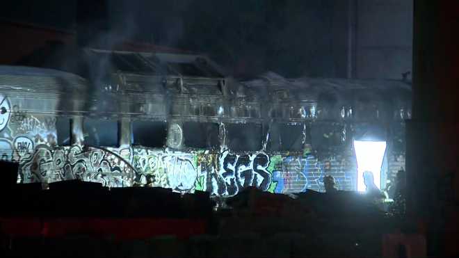 Retired train goes up in flames at Somerville MBTA facility