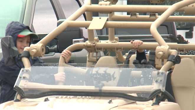 Reverse parade honors military veterans in Louisville