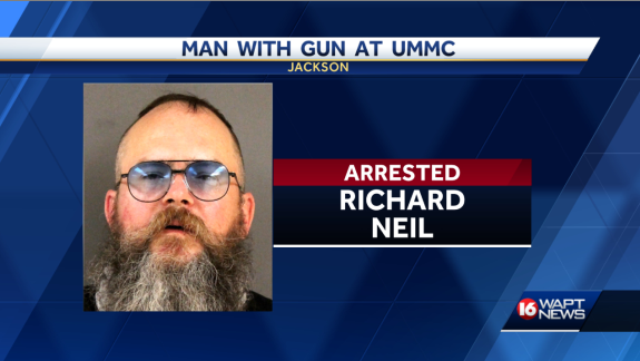 Man armed with gun accused of resisting arrest, assaulting officer