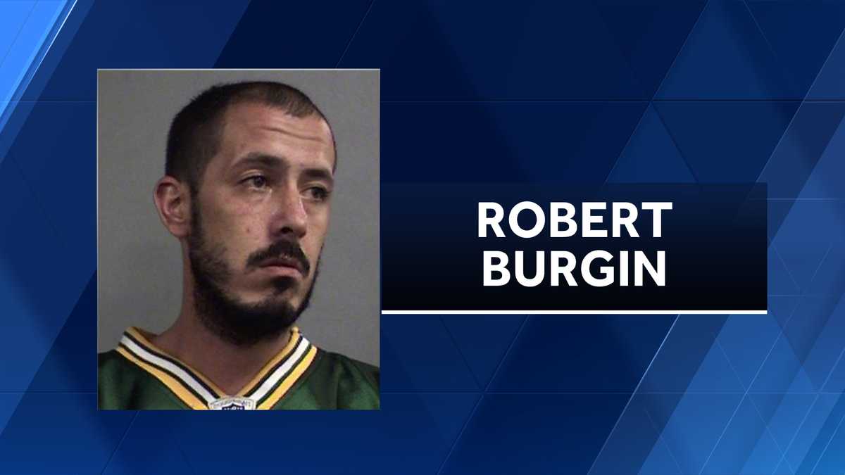 Man on bike carrying Tiki torches arrested on drug charges