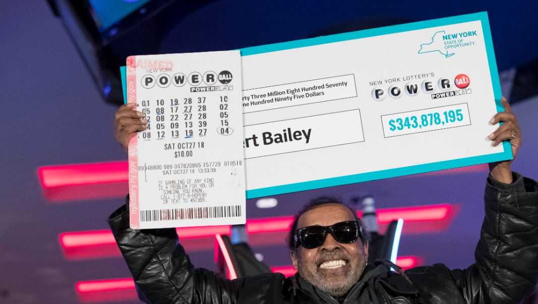 Retired government worker revealed as $343M Powerball winner
