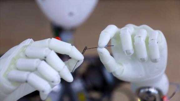 Watch this robot thread a needle