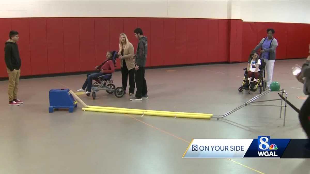 Robotics students create machine to help classmates with disabilities