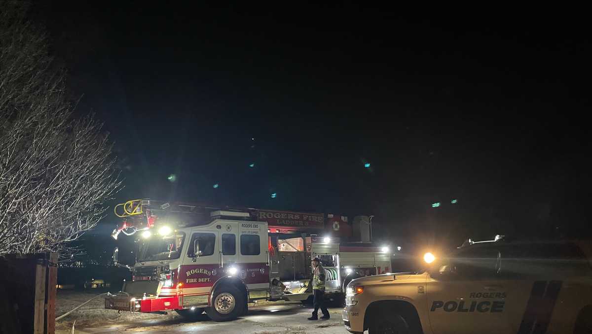 Crews return to scene after house fire in Rogers reignites