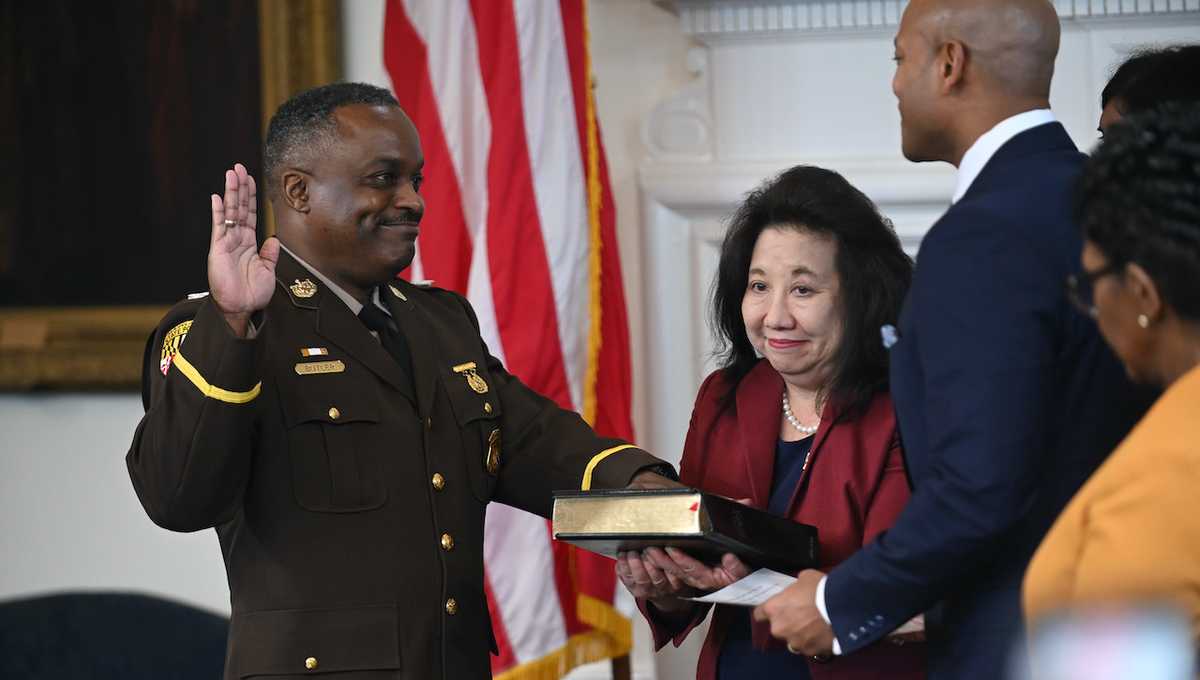 Governor swears in Roland Butler as state police superintendent