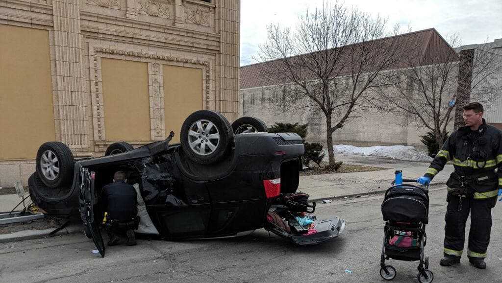 Surveillance video captures rollover crash where baby was rescued from ...
