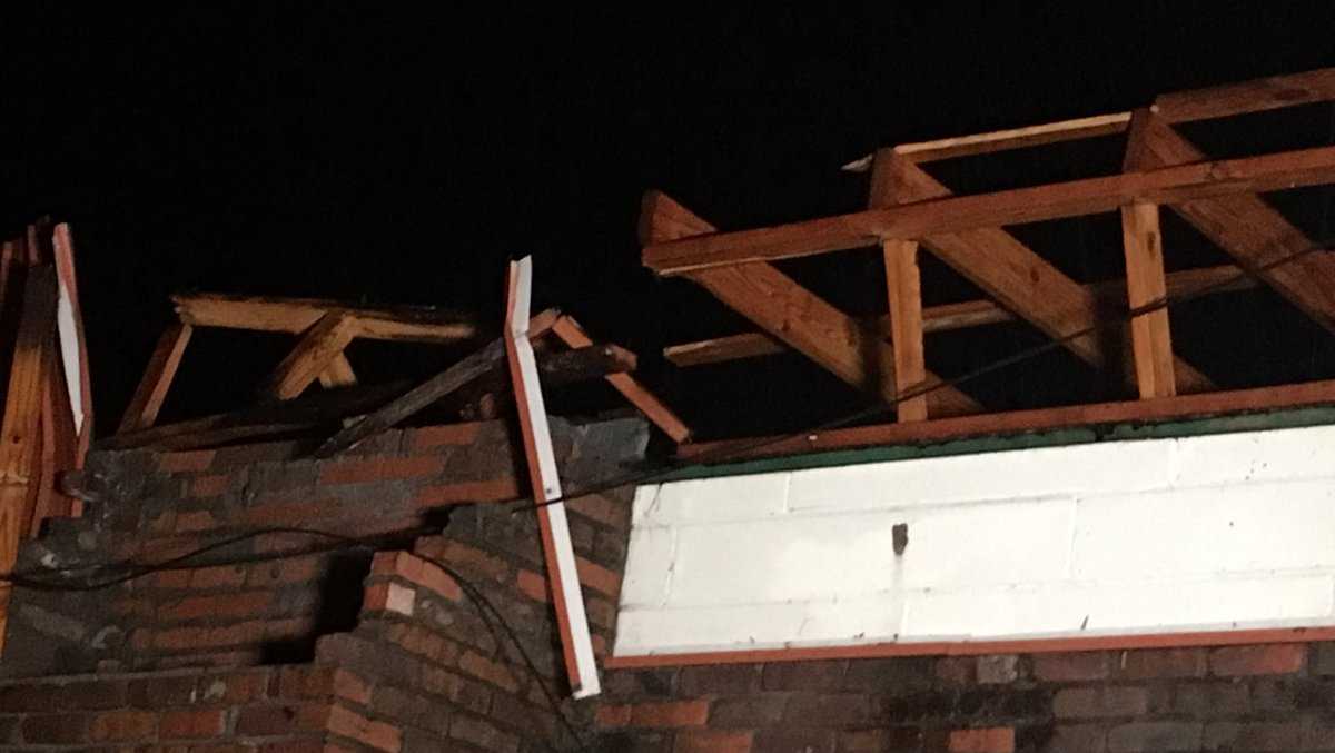 Severe storms tear roof off building