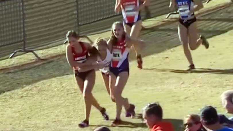 Clemson runner helps opponent cross finish line after collapse during ...