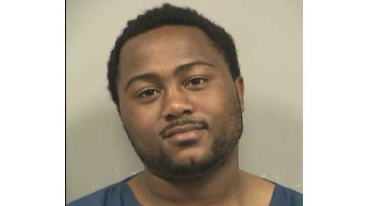 KC man charged with firing shots that hit unmarked police car