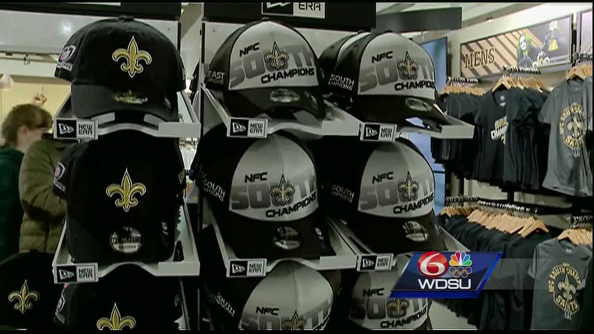 Saints fans pack stores to grab NFC South Champions gear