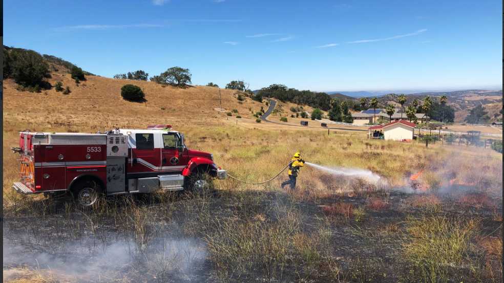 Firefighters snuff out wildfire off Highway 68