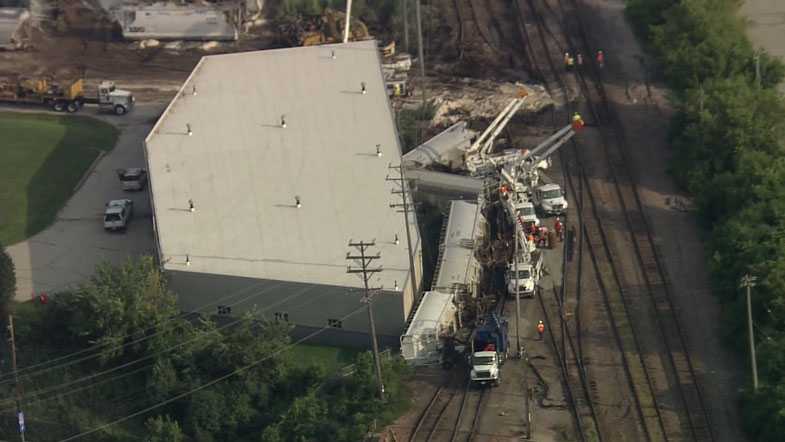 Train cars derail, spill sand in Wauwatosa