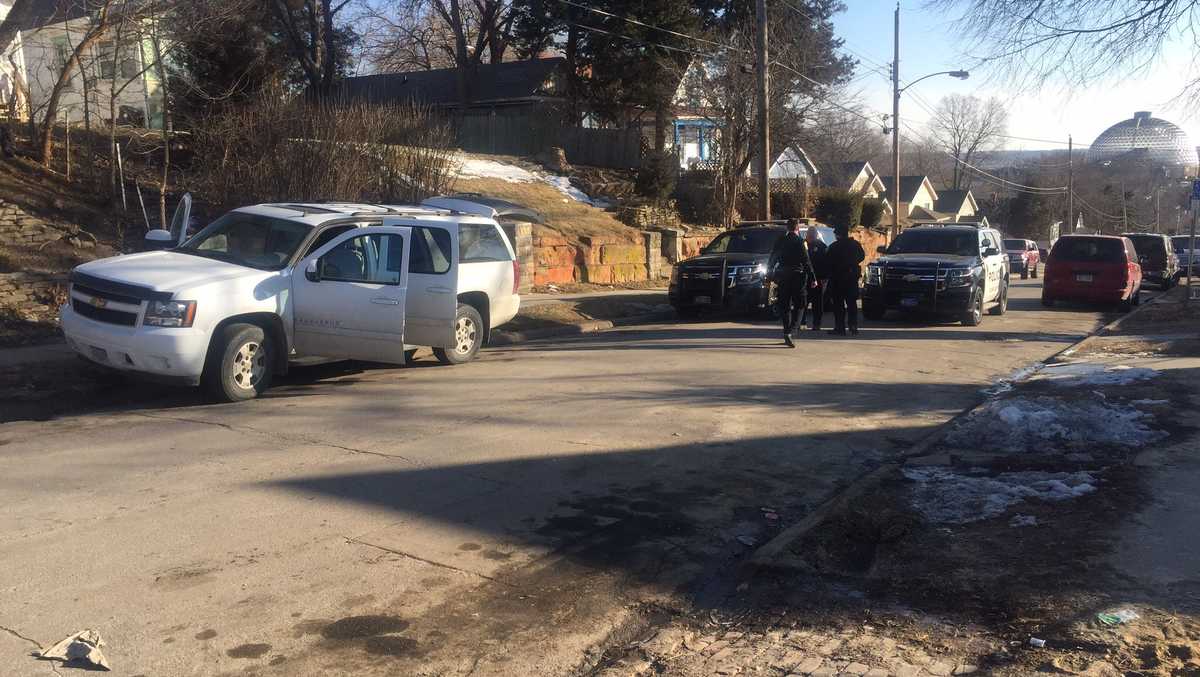 Police Officers Searching For Armed And Dangerous Suspect After Carjacking