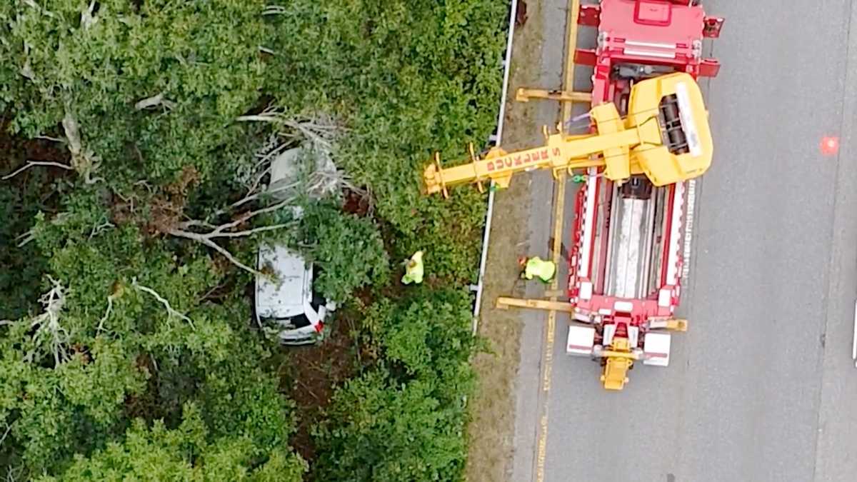 School transport van crashes into woods on Cape Cod highway