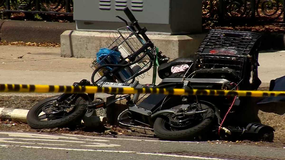 Man on scooter struck by box truck at busy Boston intersection